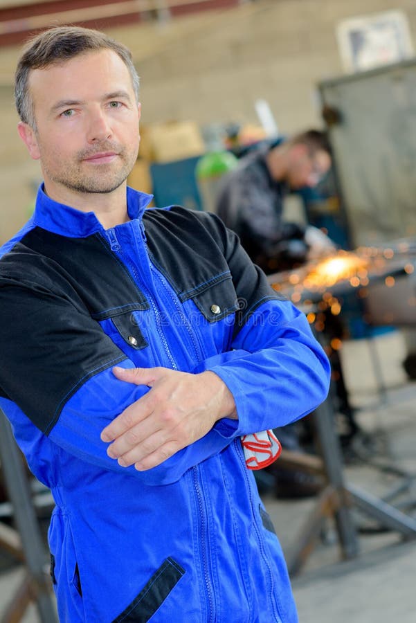 Portrait Workman in Overalls Stock Photo - Image of sparks, handsome ...