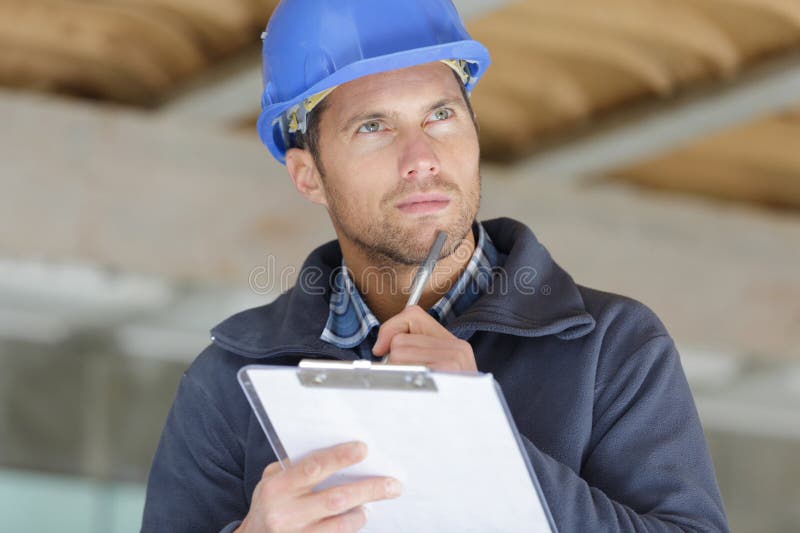 Portrait Workman Preparing Estimate for Work on House Stock Image ...