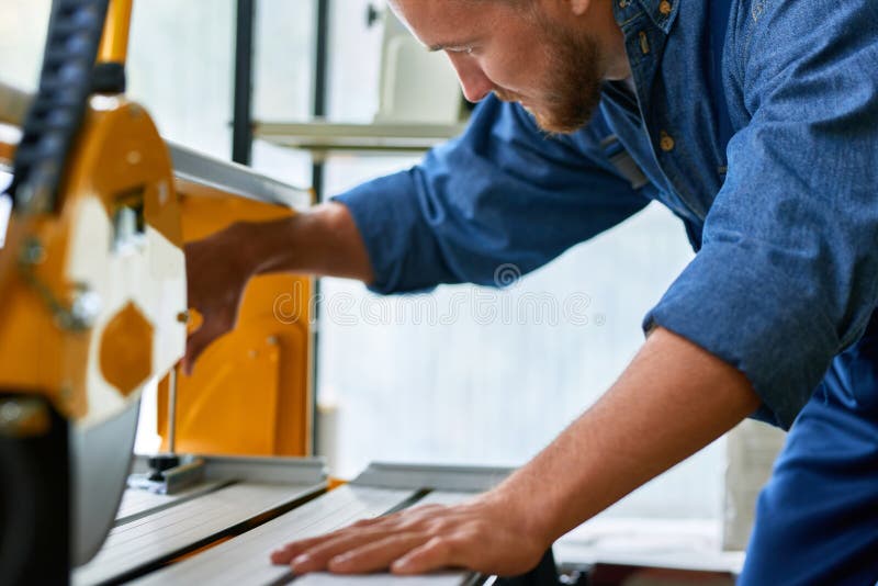 Factory Worker Using Machines Stock Photo - Image of woodwork, engineer ...