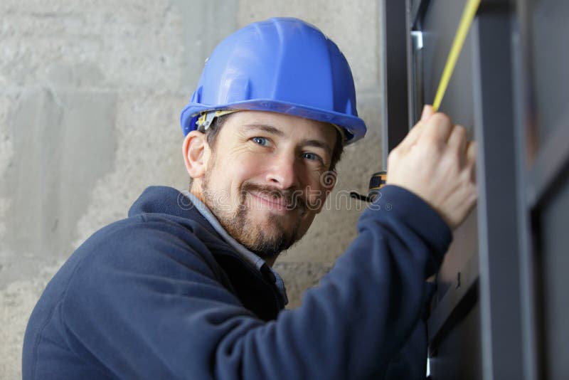 Portrait Workman Using Tape Measure Stock Image - Image of repairman ...