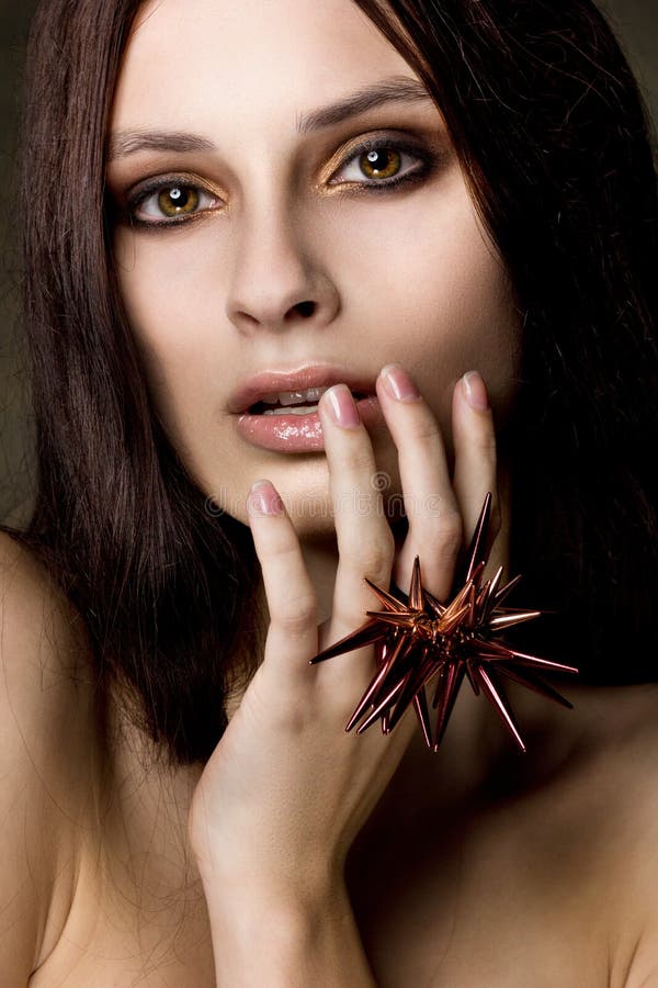 Portrait of a Youn Oriental Girl with Rivet Ring Stock Photo - Image of ...