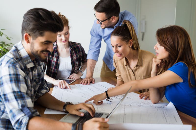 Portrait of Architects Having Discussion in Office Stock Image - Image ...
