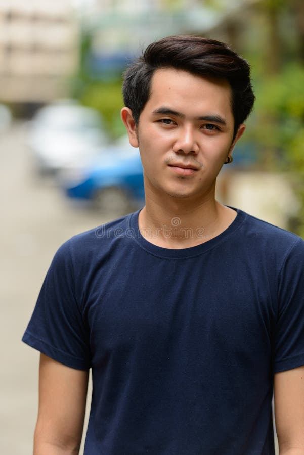 Portrait of Young Asian Man in the Streets Stock Photo - Image of town ...