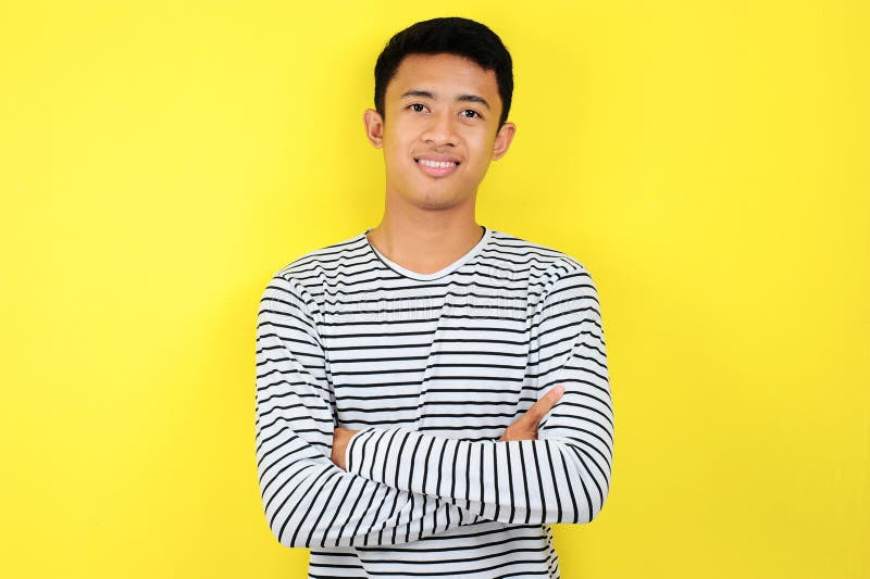 Portrait of Young Asian Man on a Yellow Stock Photo - Image of ...