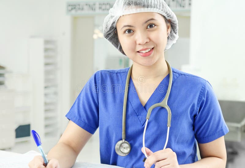 Operating room nurse stock image. Image of attractive - 17420219