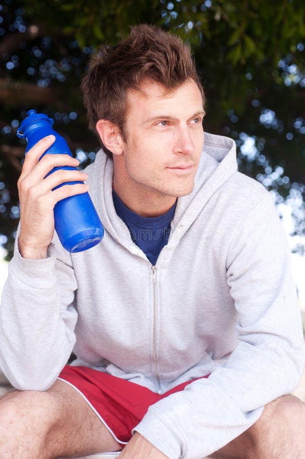 Portrait of a Young Athletic Runner with Water Bot Stock Photo - Image ...