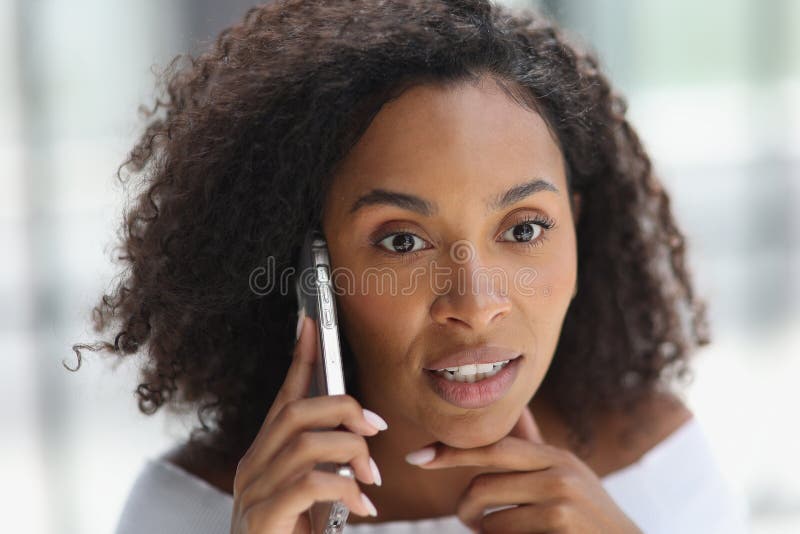 Portrait Of A Young Attractive African American Woman Talking On The