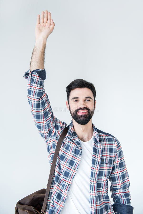 Portrait of Young Bearded Man with Raising Hand in Studio Stock Image ...