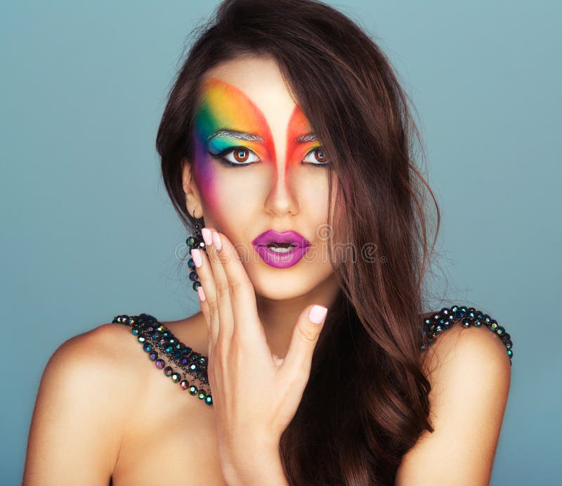 Portrait Of A Young Beautiful Girl With A Fashion Bright Multicolored
