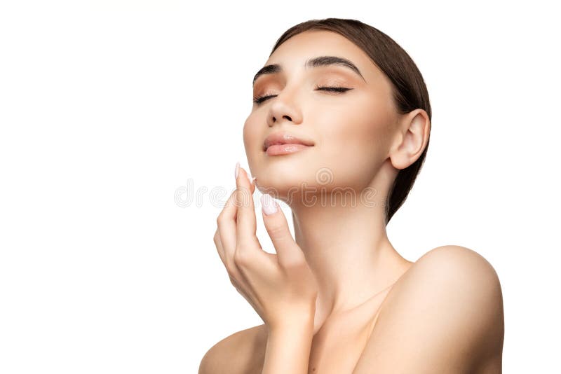 Portrait Of Young Beautiful Woman Applying Face Cream Taking Care