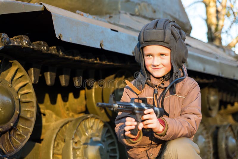 Portrait of Young Boy with Gun Stock Image - Image of brave ...