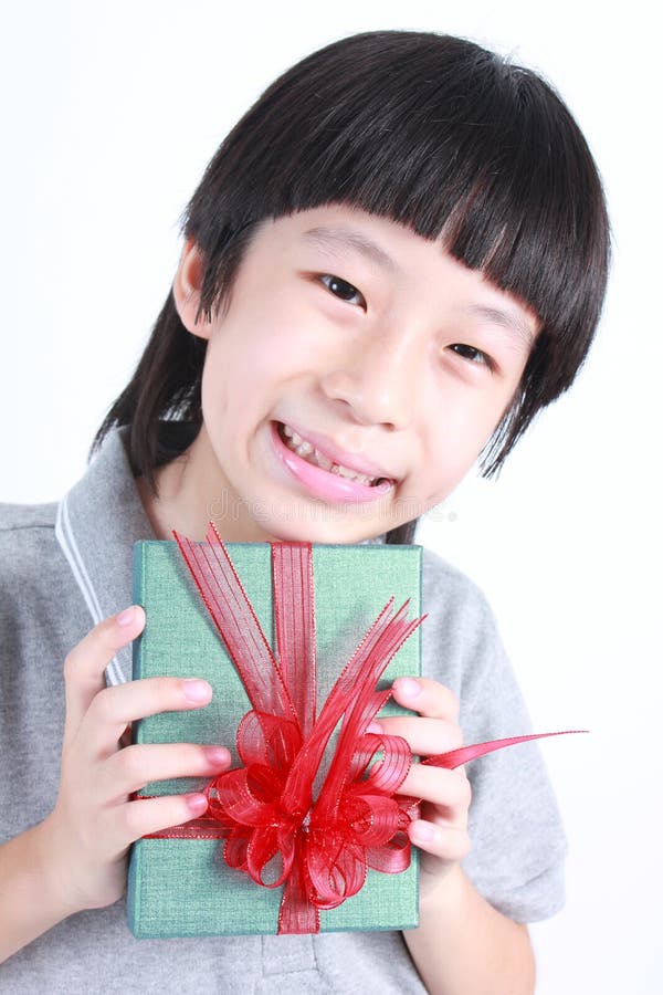 Portrait of Young Boy Holding a Present Stock Image - Image of ...