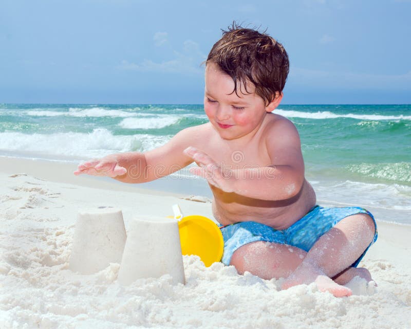 Portrait of Young Boy Playing in Sand at Beach Stock Photo - Image of ...