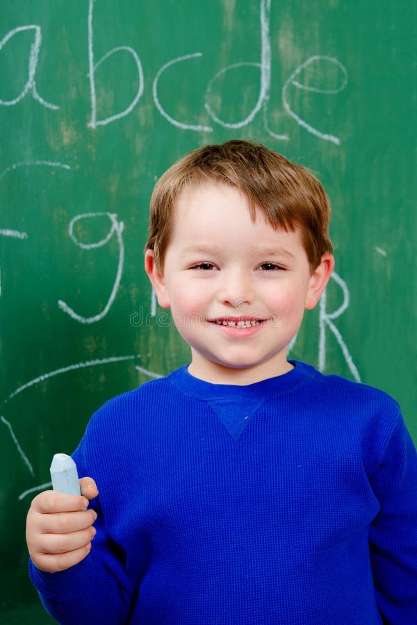 Portrait of Young Boy after Writing on Chalkboard Stock Photo - Image ...