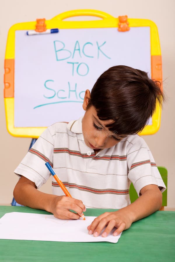 Portrait of a Young Boy Writing Notes Stock Image - Image of concept ...