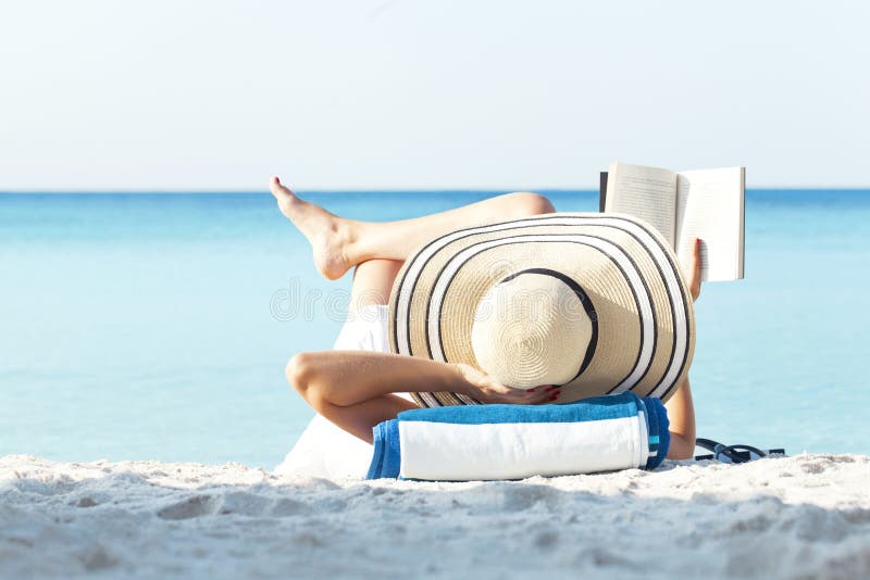 Reading on Beach stock image. Image of reading, summer - 151518627