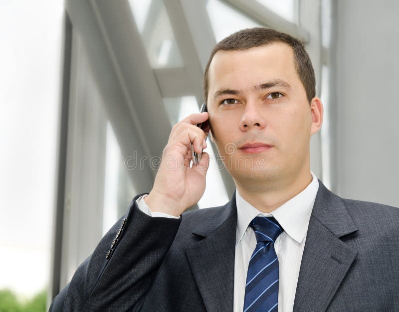 Portrait of Young Businessman Calling by Telephone Stock Image - Image ...