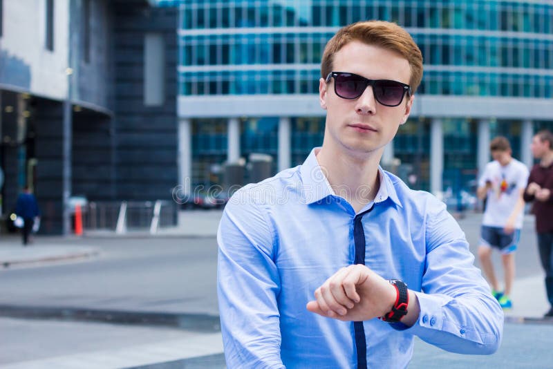 Portrait of Young Businessman Looking at the Clock and Waiting for the ...