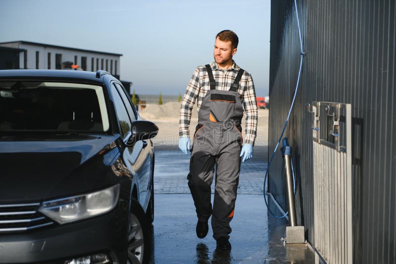 Portrait of a Young Car Wash Worker Stock Image - Image of studio ...