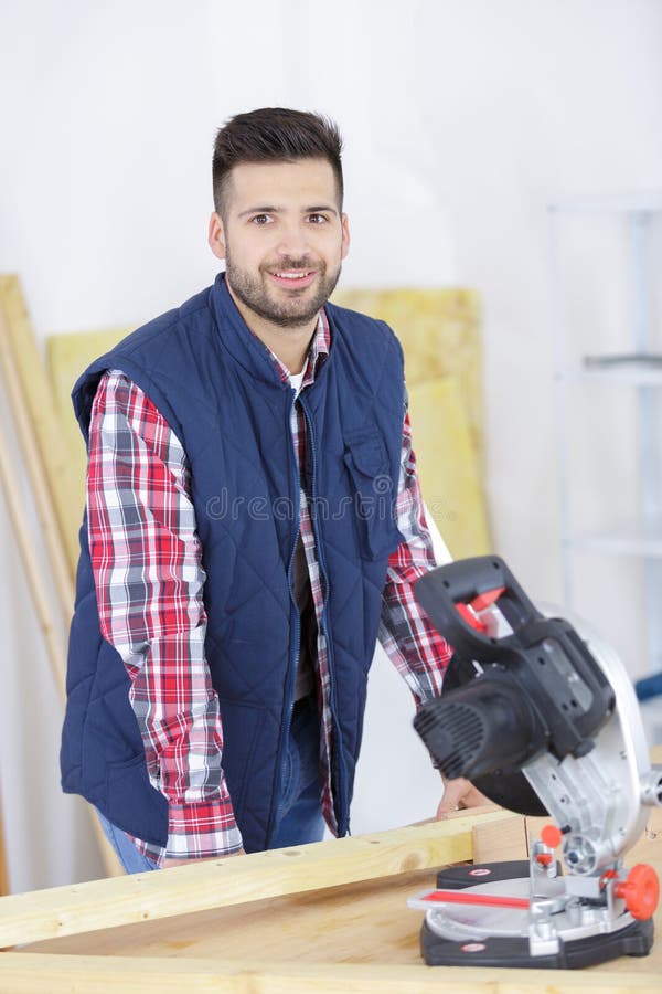 Portrait young carpenter stock photo. Image of woodshop - 267207780