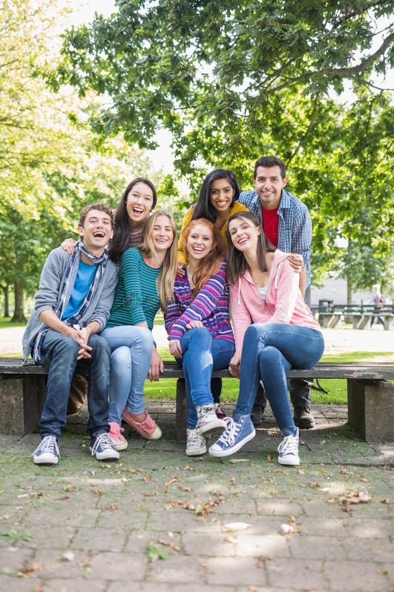 Portrait of Young College Students in Park Stock Photo - Image of ...