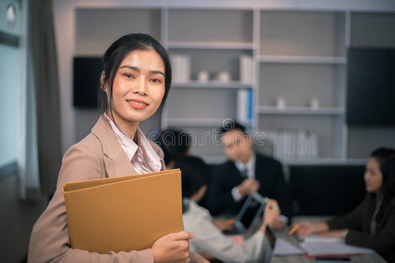 Portrait of a Young Confident Female Office Manager at Her Workplace ...