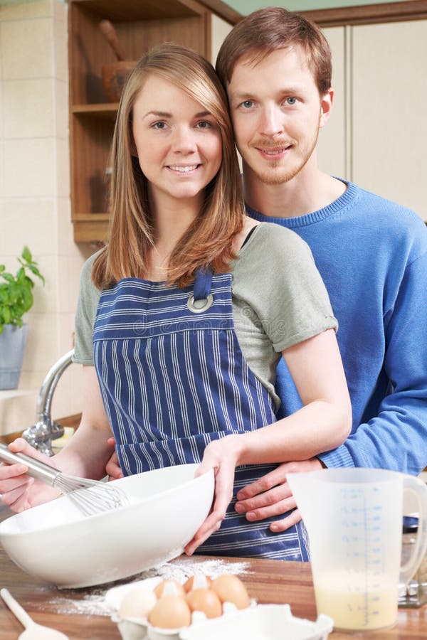 Portrait of Young Couple Baking in Kitchen Together Stock Photo - Image ...