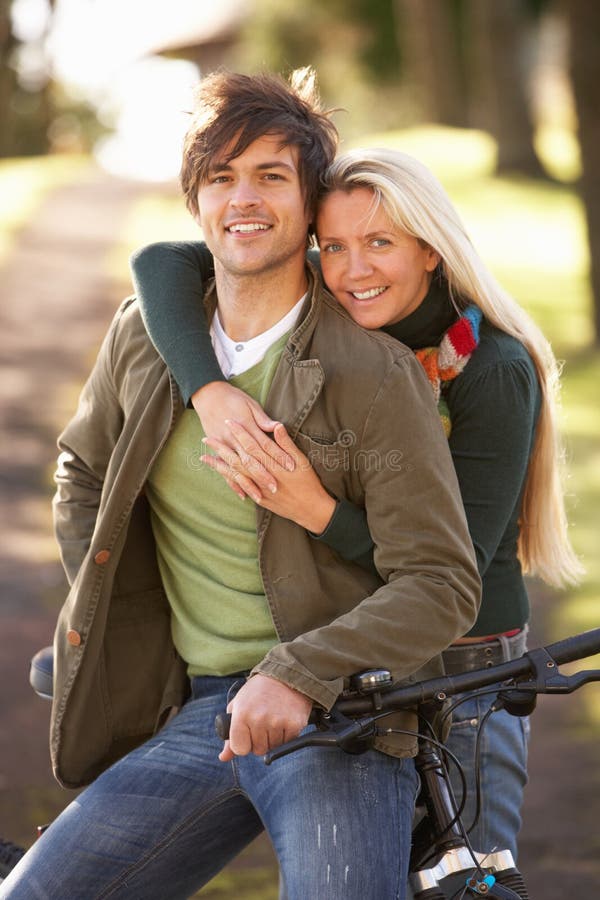 Couple on Bikes stock image. Image of young, bike, countryside - 5317421