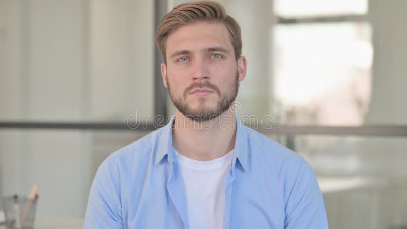 Portrait of Young Man Looking at Camera Stock Photo - Image of ...