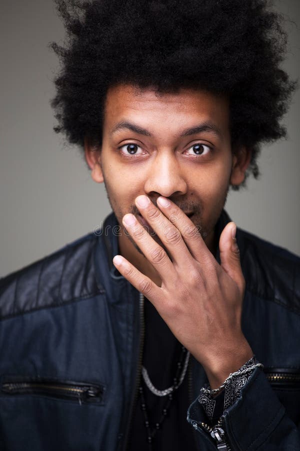 Dark-skinned Student Looking at Camera with Surprised Guilty Expression ...