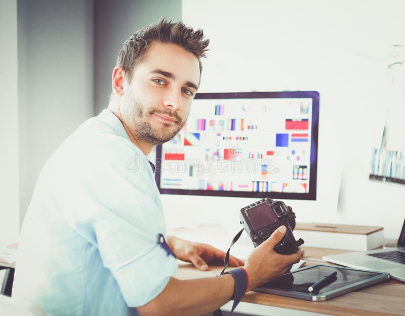 Portrait of Young Designer Sitting at Graphic Studio in Front of Laptop ...