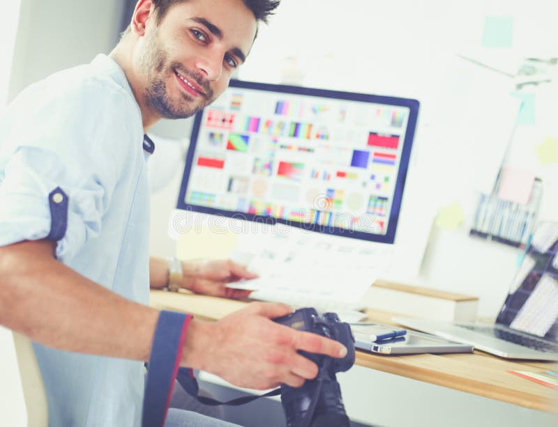 Portrait of Young Designer Sitting at Graphic Studio in Front of Laptop ...