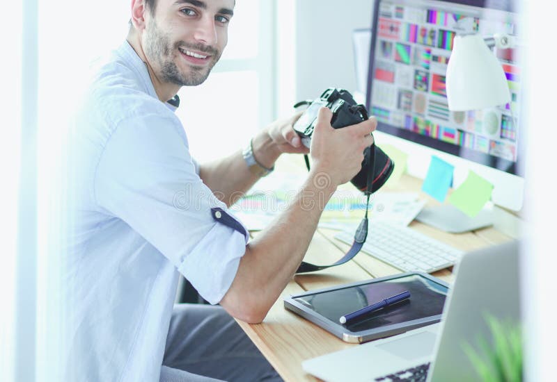 Portrait of Young Designer Sitting at Graphic Studio in Front of Laptop ...