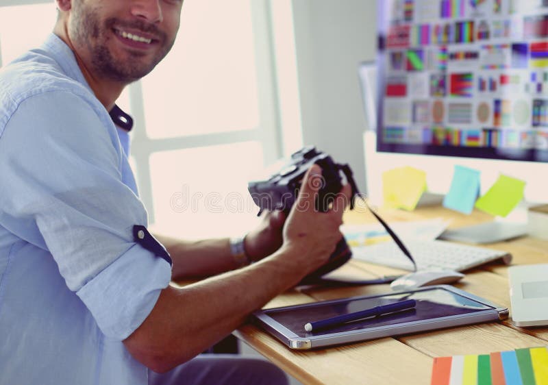 Portrait of Young Designer Sitting at Graphic Studio in Front of Laptop ...
