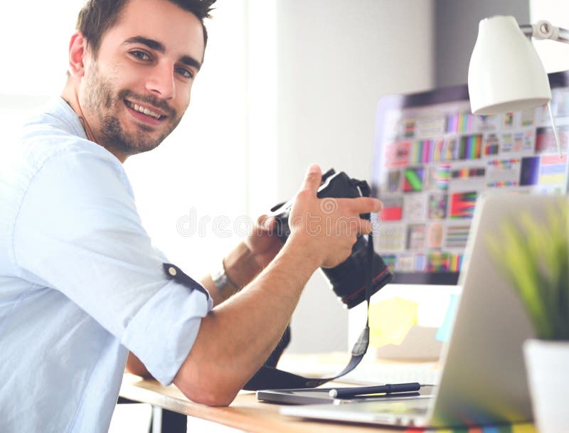 Portrait of Young Designer Sitting at Graphic Studio in Front of Laptop ...