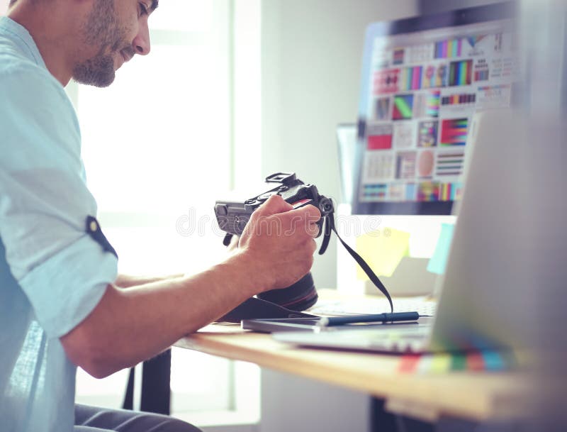 Portrait of Young Designer Sitting at Graphic Studio in Front of Laptop ...