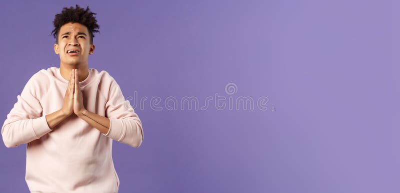 Portrait of Young Distressed and Devestated Hispanic Guy Pleading To ...