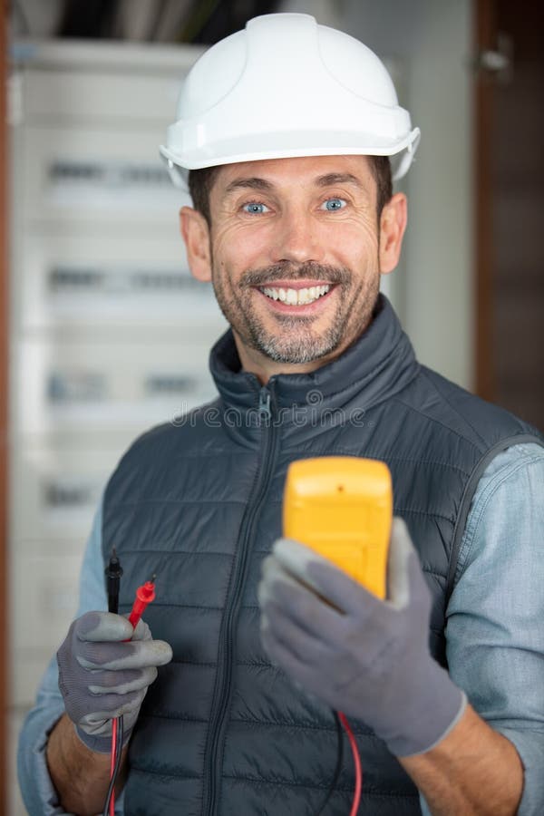 Portrait Young Electrician Using Multimeter Stock Image - Image of ...