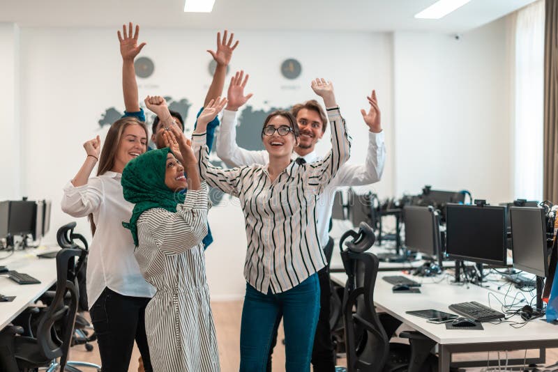 Portrait of Young Excited Multiethnics Business Team of Software ...