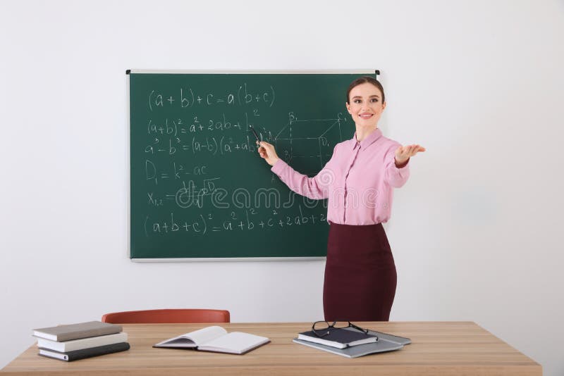 Portrait of Young Female Teacher Stock Photo - Image of class ...