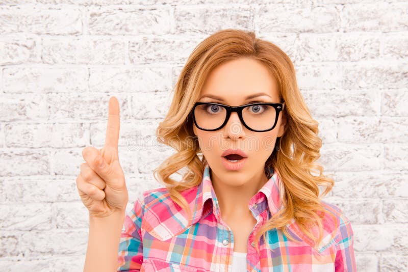 Portrait of Young Genious Woman in Glasses Having an Idea Stock Photo ...