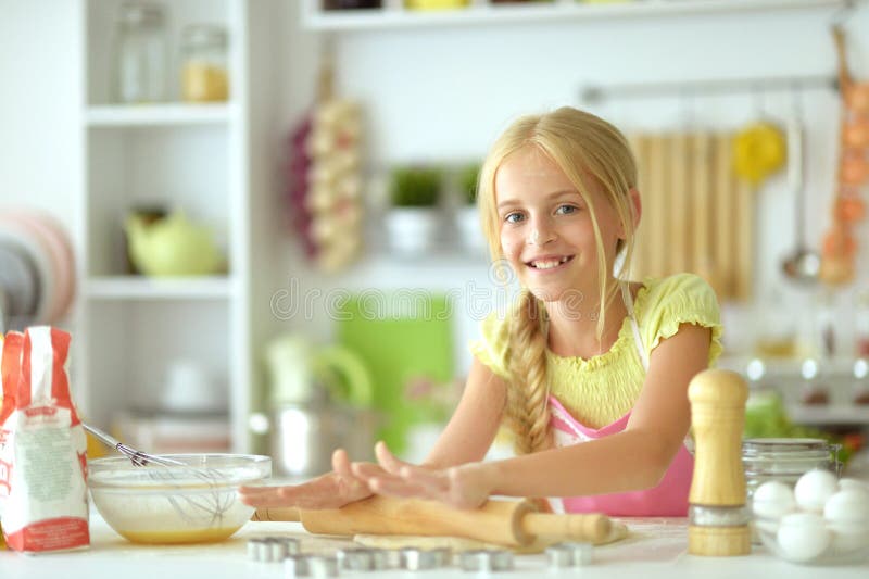Portrait of a Young Girl Baking in the Kitchen Stock Image - Image of ...