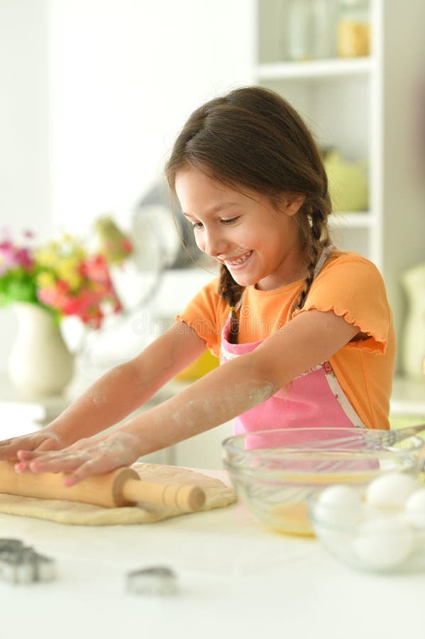 Portrait of a Young Girl Baking in the Kitchen Stock Image - Image of ...