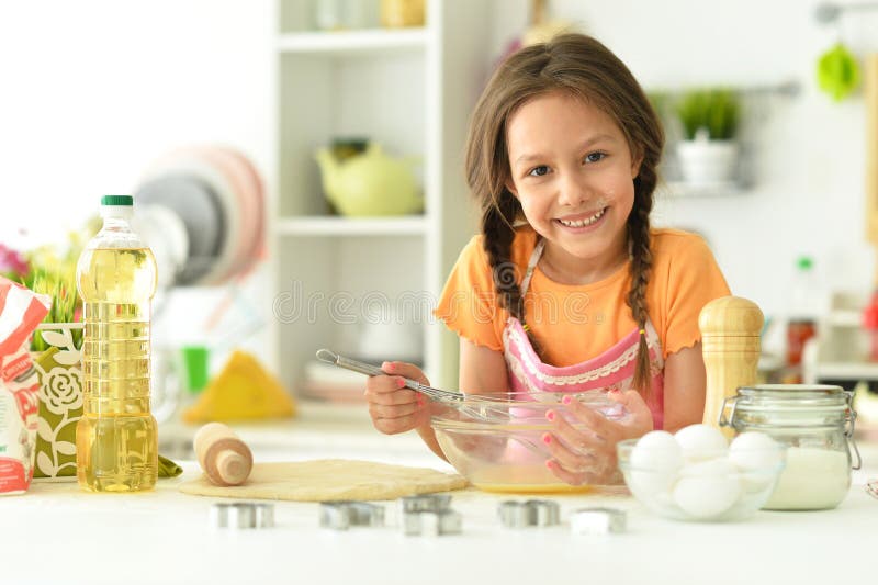 Portrait of Young Girl Baking in the Kitchen Stock Image - Image of ...