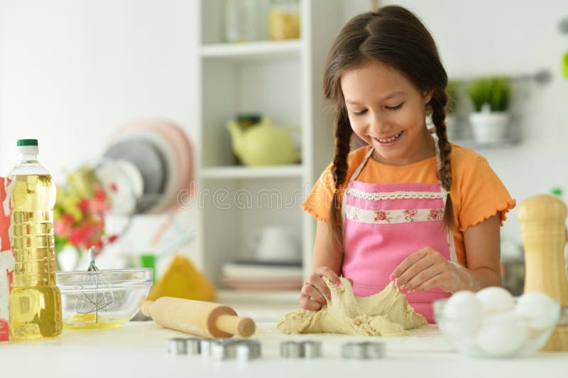 Portrait of Young Girl Baking in the Kitchen Stock Photo - Image of ...