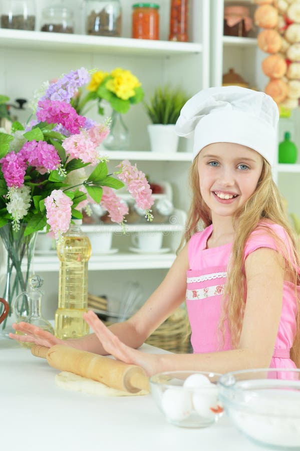 Portrait of Young Girl Baking in the Kitchen Stock Photo - Image of ...