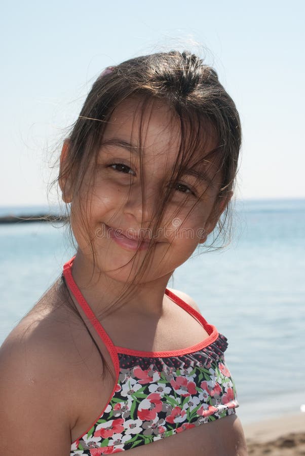 Young girl at the beach stock image. Image of holidays - 20250537