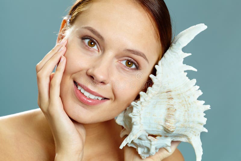 Girl with shell stock photo. Image of closeup, echinoderm - 30215672