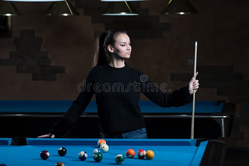 Portrait of a Young Girl Playing Billiards Stock Photo - Image of girl ...