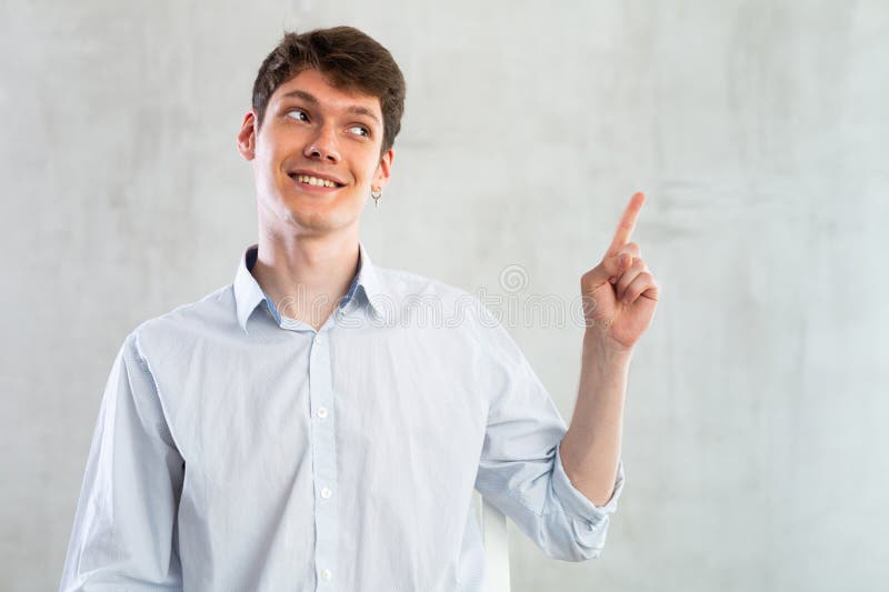Portrait of Young Guy Gesturing in Studio Stock Photo - Image of look ...